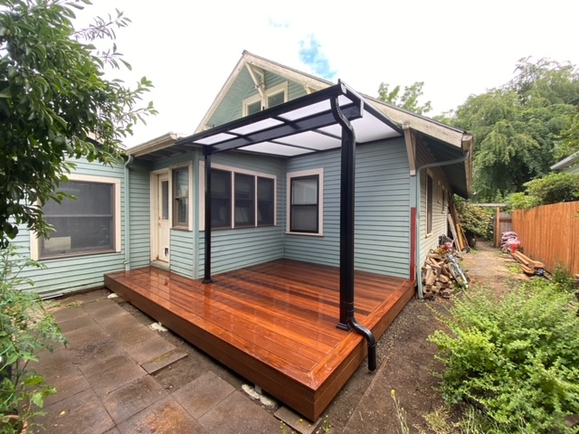 Ipe deck with Acrylite cover - Deck Masters, LLC